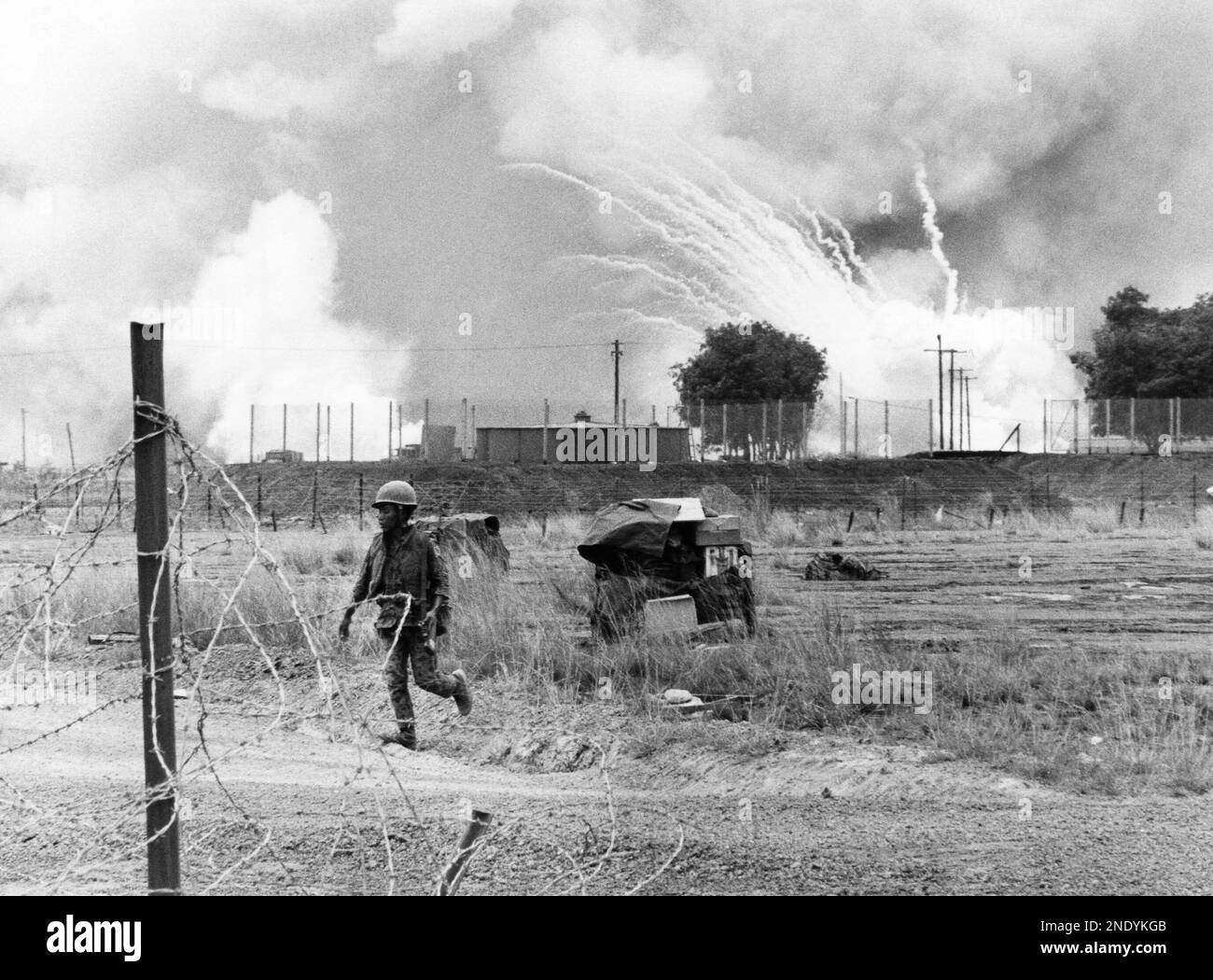 Soldier evacuates the area as smoke billows from ammunition dump at Lai ...