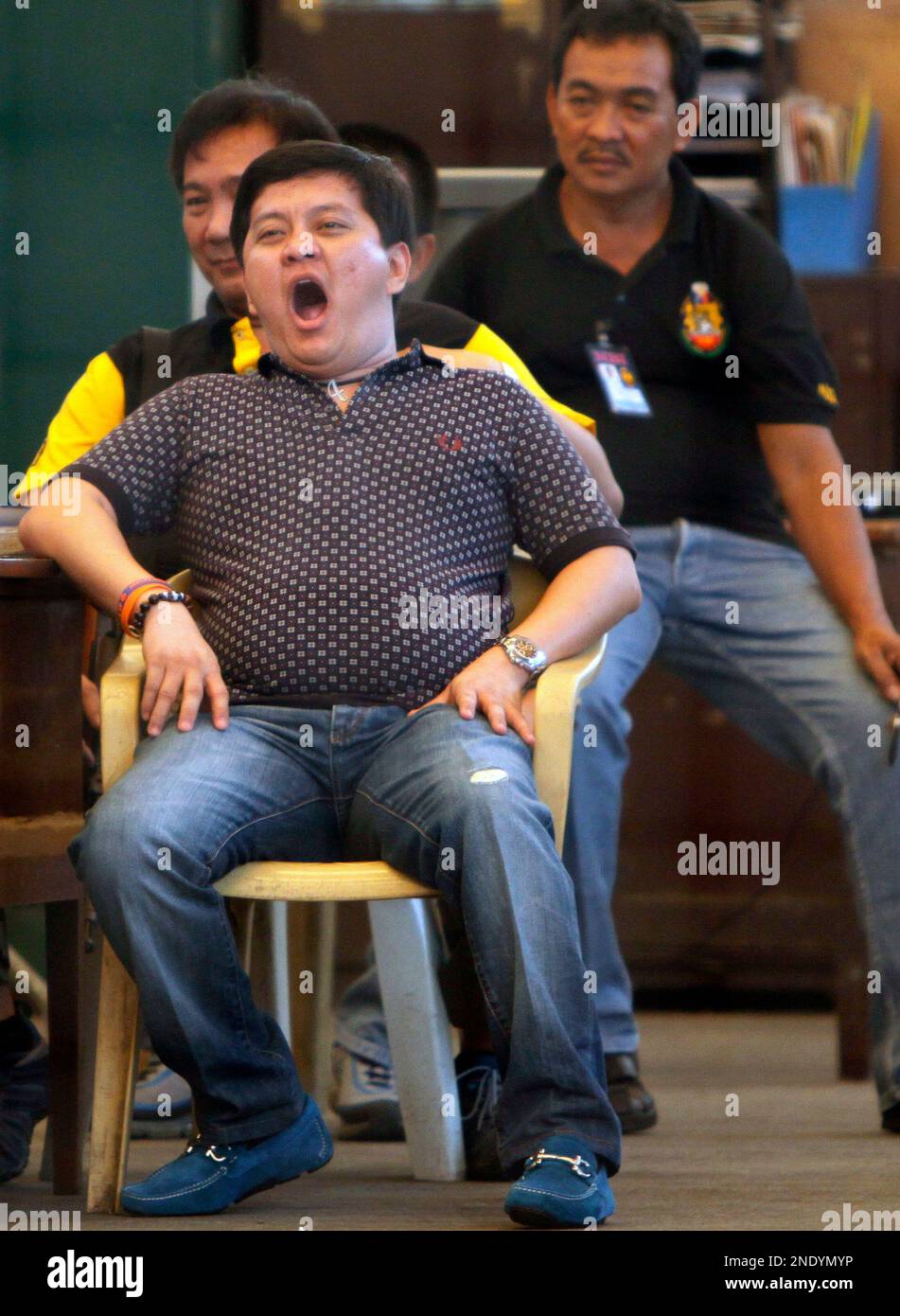 Andal Ampatuan Jr. a scion of a powerful southern clan, yawns as he ...
