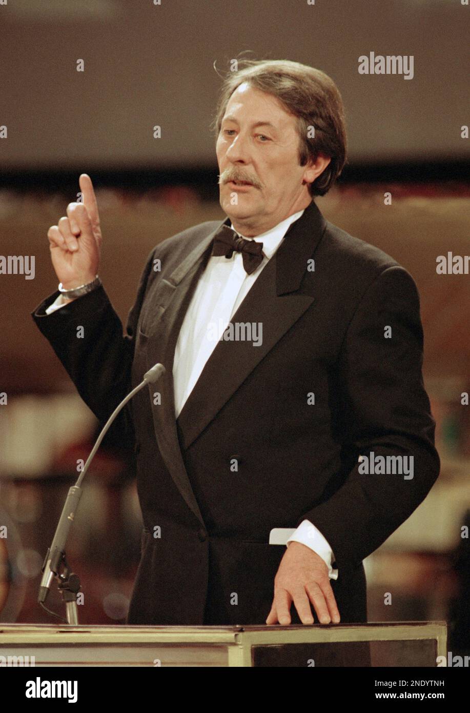 French comedian Jean Rochefort points while speaking at the "Cesars ...