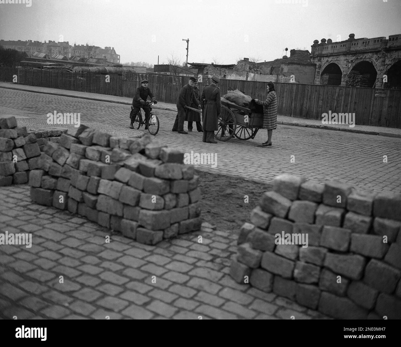Soviet-controlled German police check a hand truck before allowing it ...