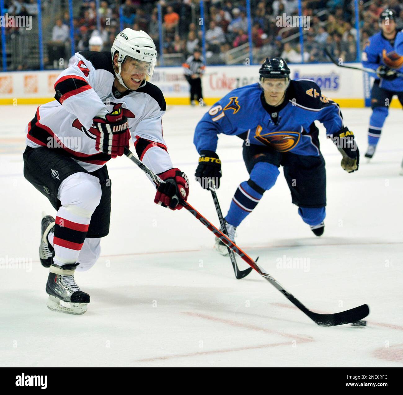 New Jersey Devils center Dainius Zubrus (8) of Lithuania, takes a shot ...