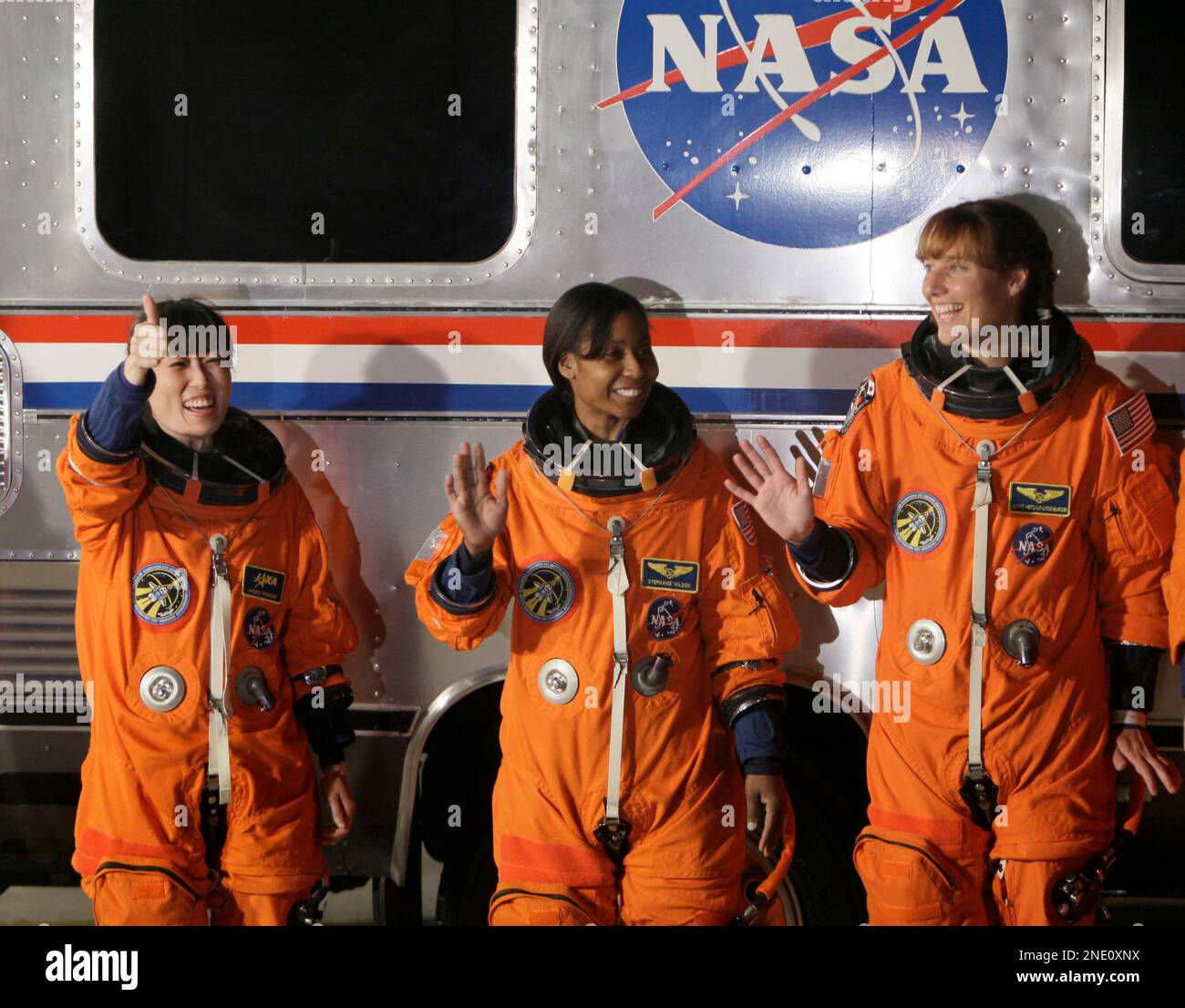 Three female astronauts of the space shuttle Discovery crew, from left ...