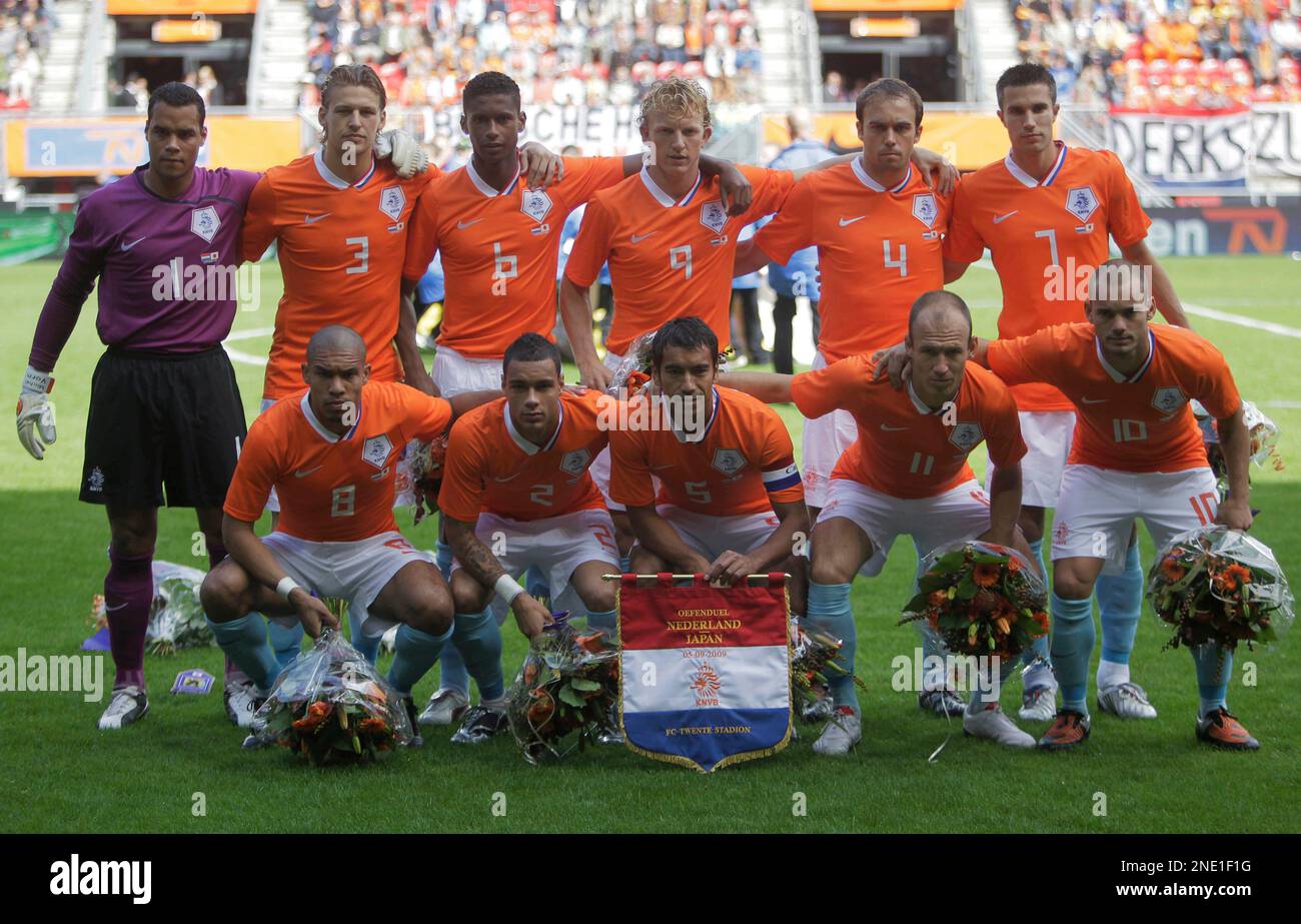 Dutch soccer players pose for a team picture with Nigel de Jong ...