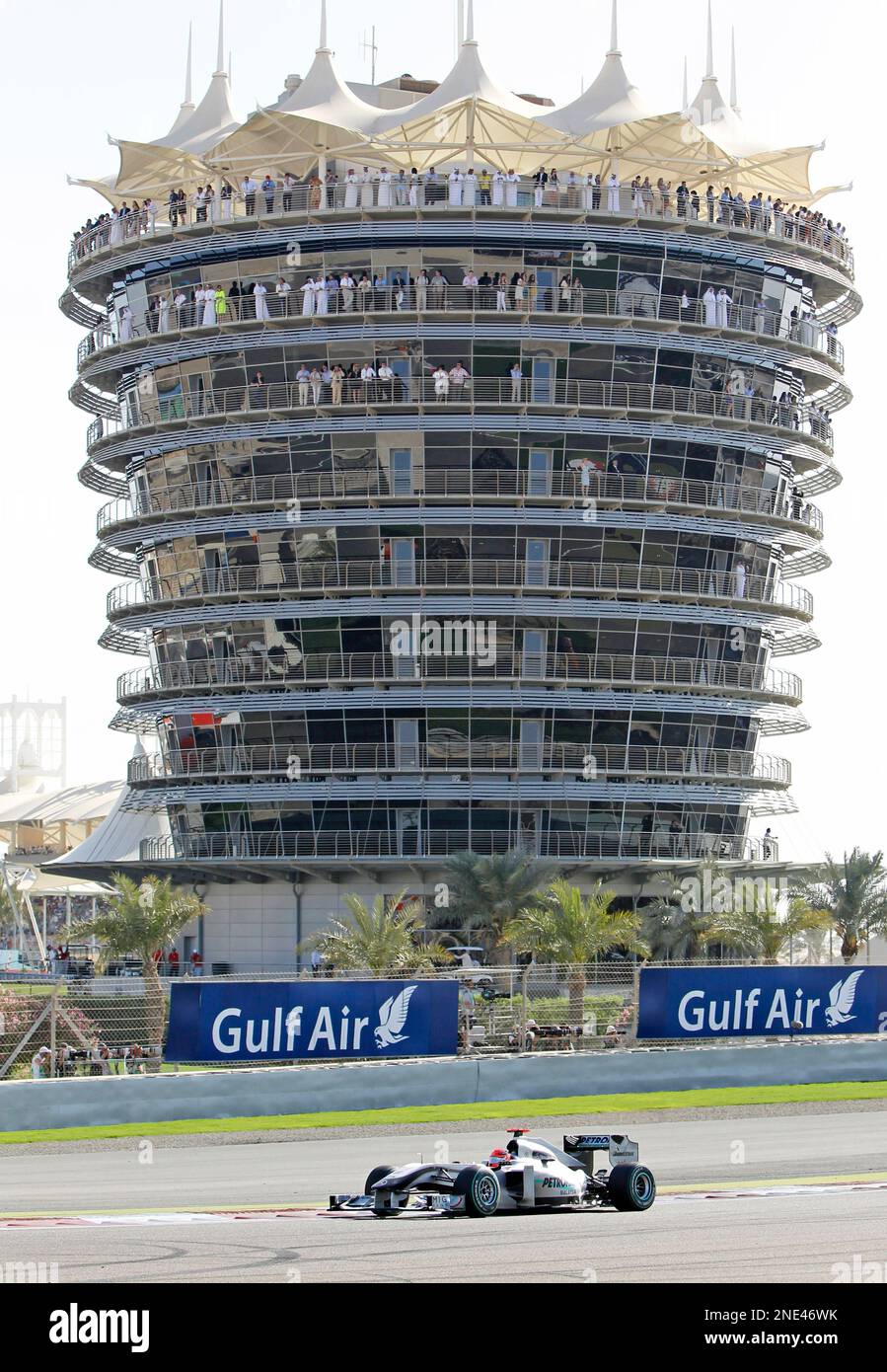 Mercedes Grand Prix driver Michael Schumacher of Germany passes the VIP ...