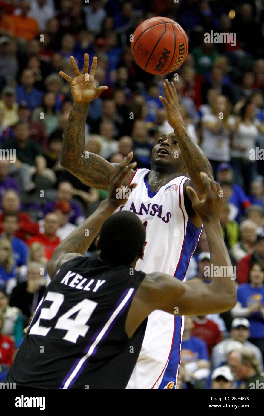 Kansas guard Sherron Collins shoots over Kansas State forward Curtis ...
