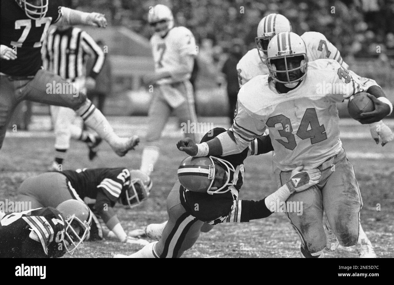 Houston Oiler running back Earl Campbell makes a short gain in second ...
