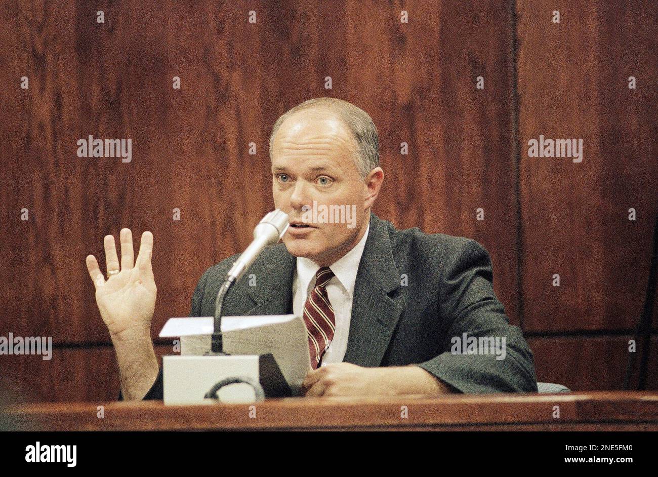 Los Angeles police Sgt. Stacey Koon reviews the report he is accused of ...