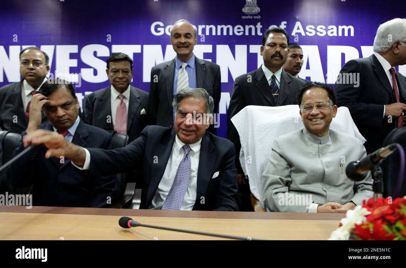 Tata Group Chairman Ratan Tata, seated center, and Assam state Chief ...