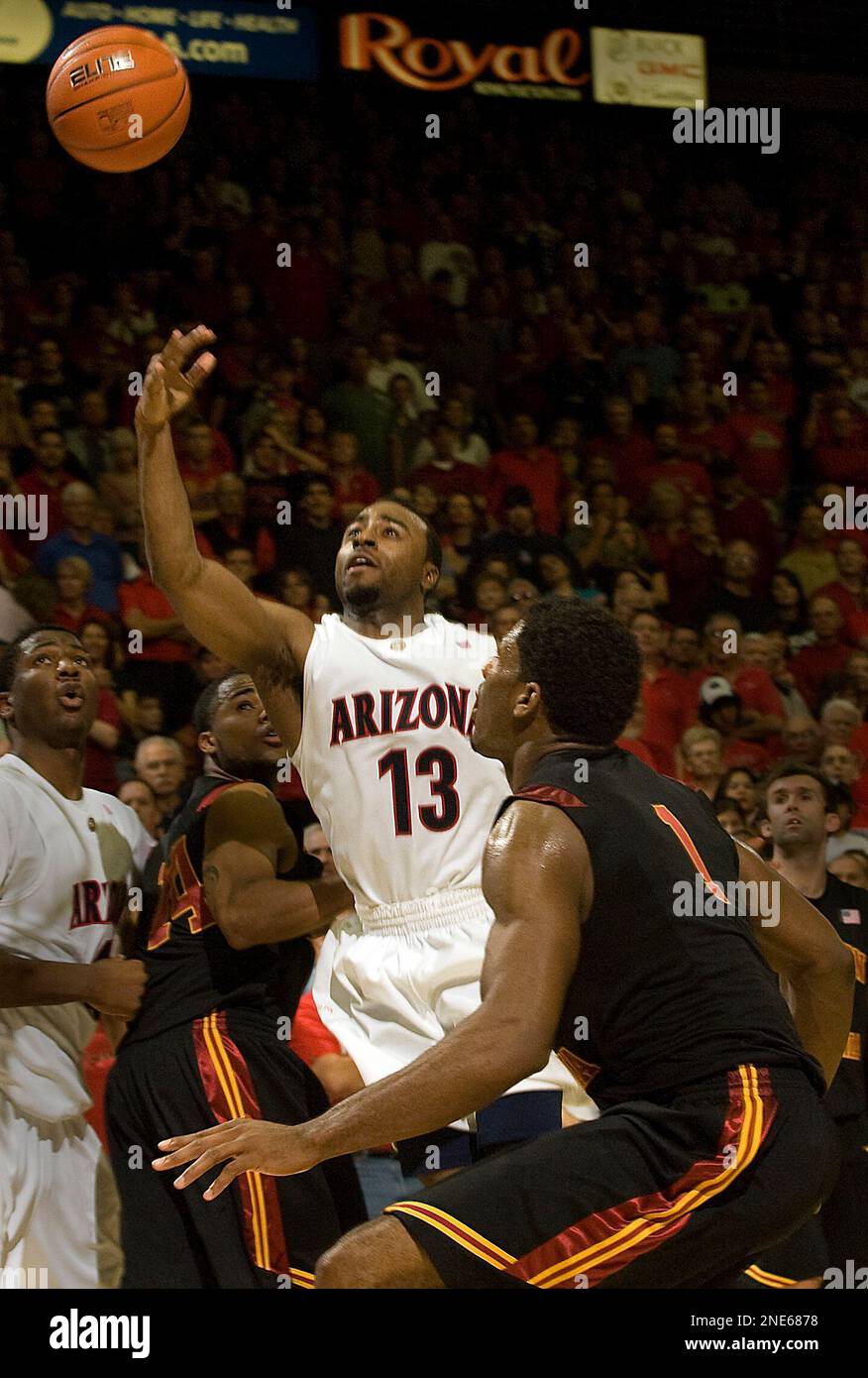 Arizona's Nic Wise (13) shoots the winning basket over Southern ...