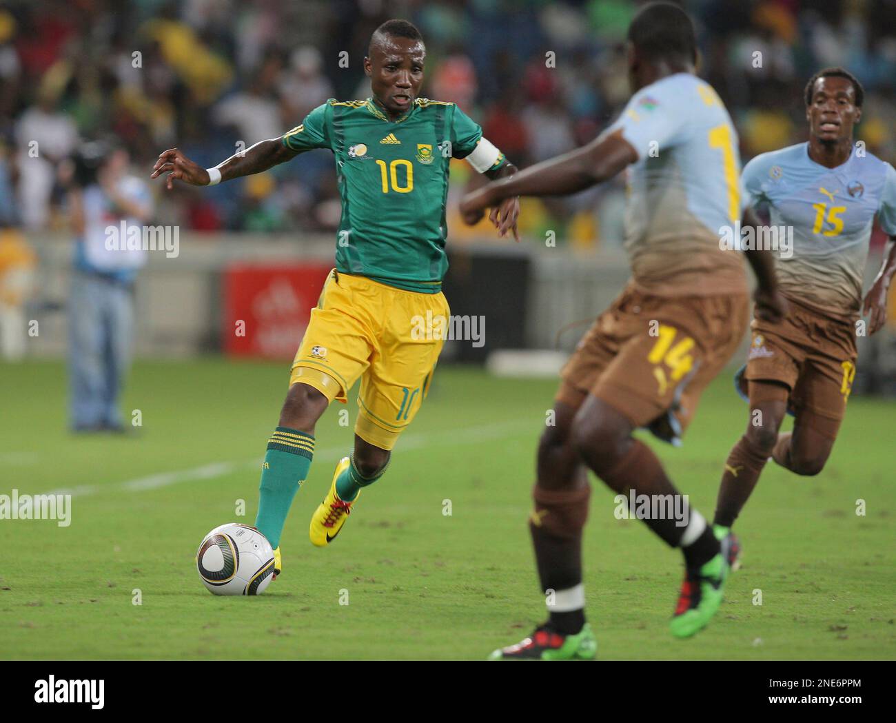 South Africa's Teko Modise, left, works his way past Namibia's Nelson ...