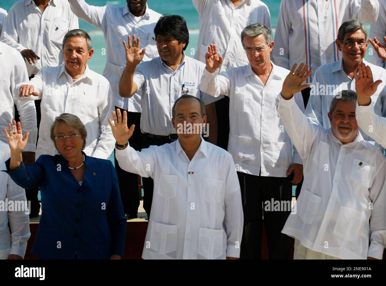 Latin American leaders attending the Rio Group summit pose for the ...