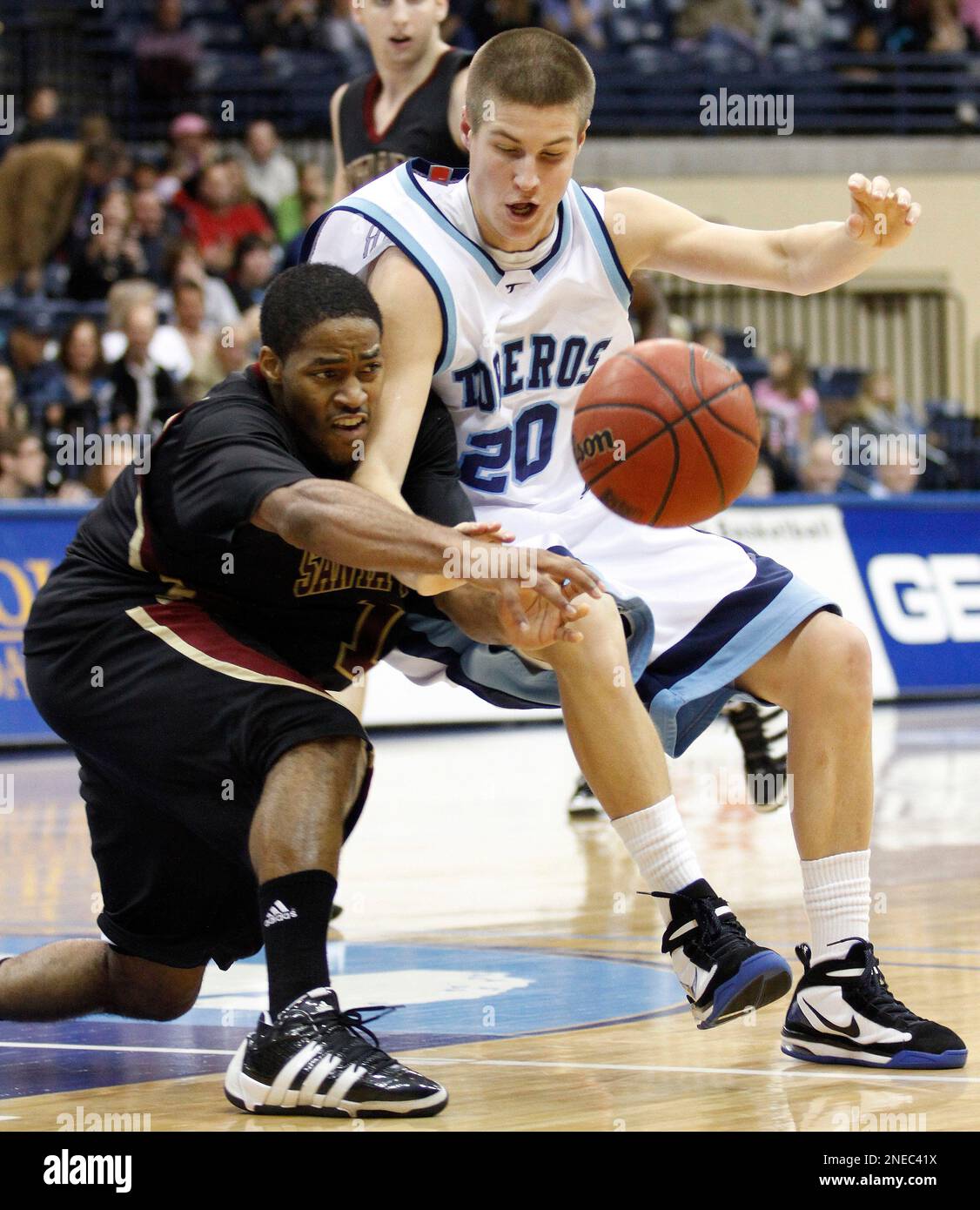 Santa Clara's Robert Smith, left, fights for the ball with San Diego's ...
