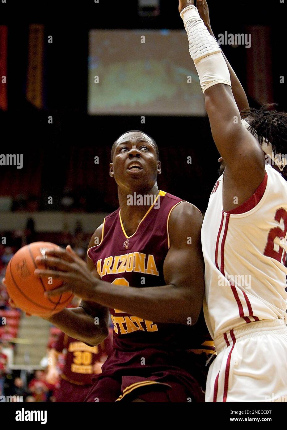 Arizona State center Eric Boateng, left, goes up for a shot as ...