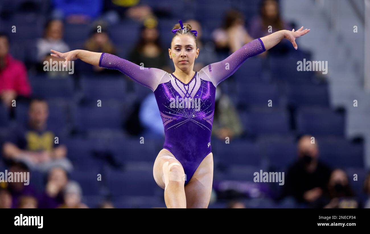 Michigan's Natalie Wojcik competes in the beam during an NCAA ...