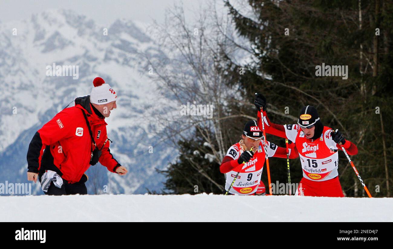 Austria's Mario Stecher, center, competes with teammate Felix Gottwald ...