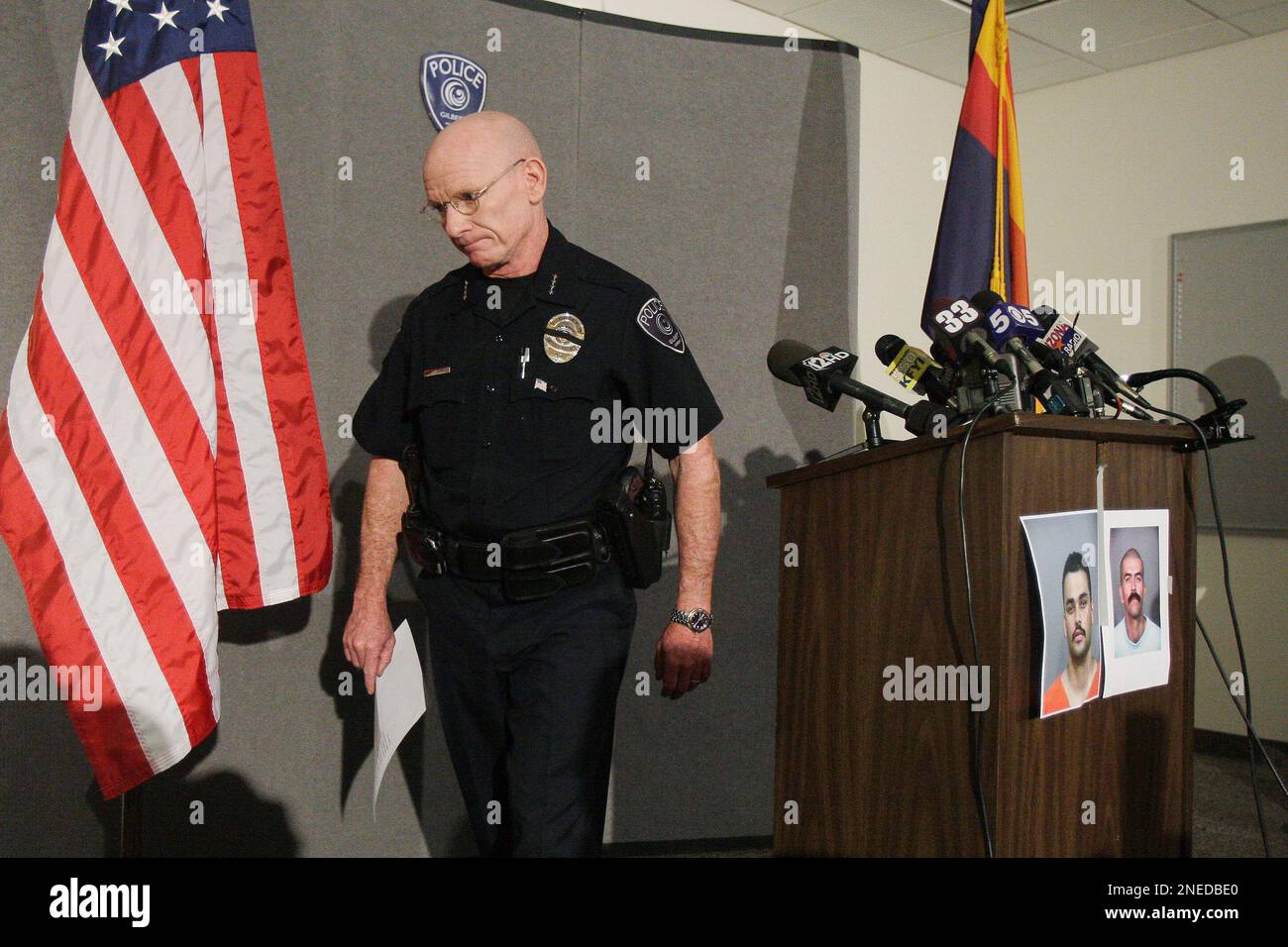 Gilbert Police Chief Tom Dorn leaves the podium after speaking at a ...