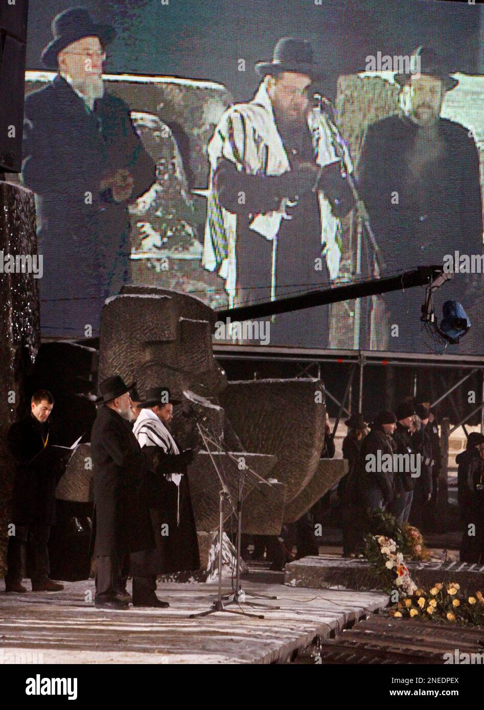 Jewish rabbis and a cantor lead prayers at the monument FOR the victims ...
