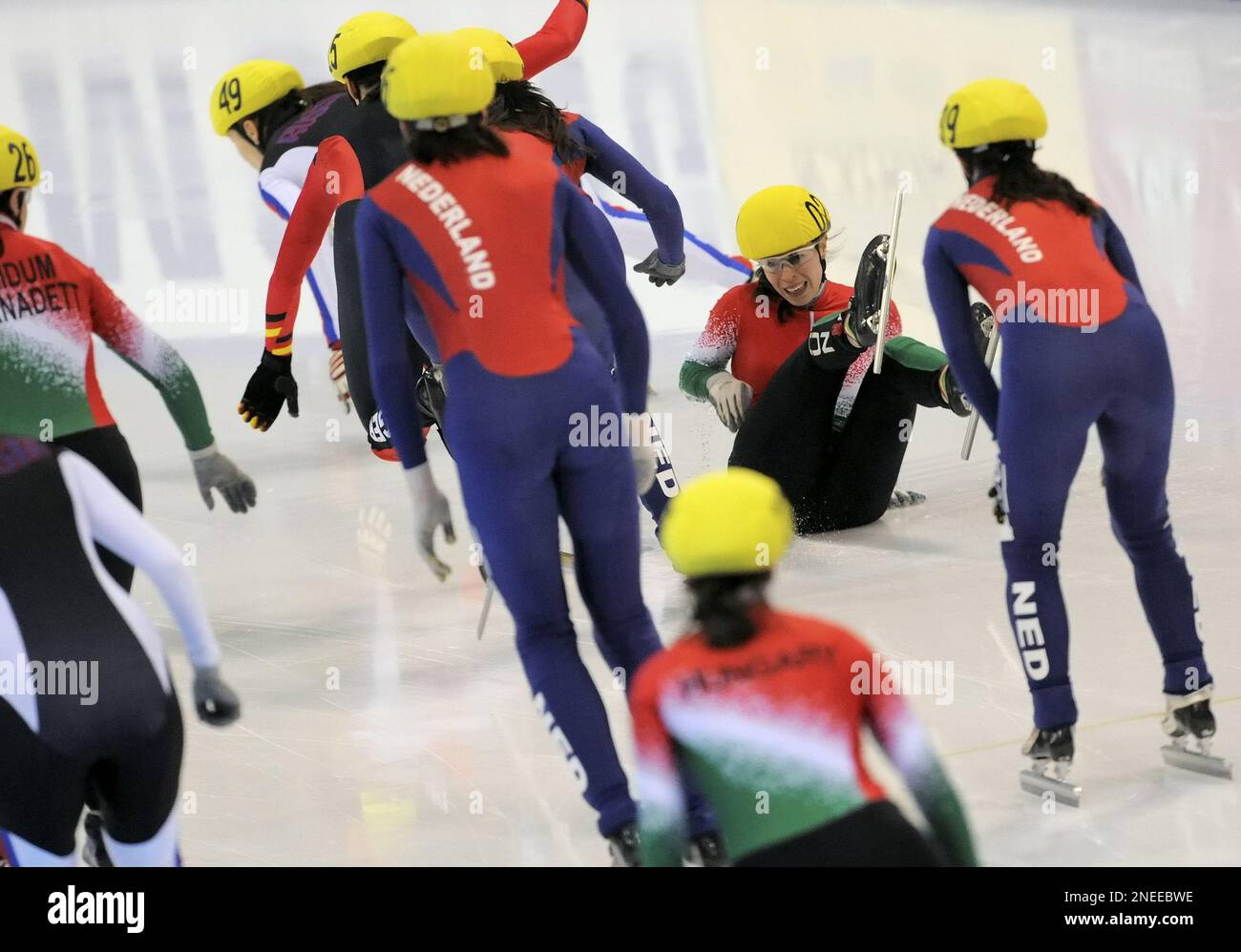 Erika Huszar of Hungary, 2nd of right, crashes during the women 3,000 ...