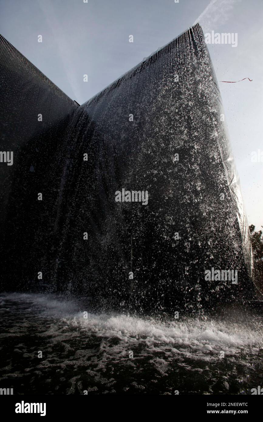 Ribbons of water flow off a mock-up waterfall designed for the National ...