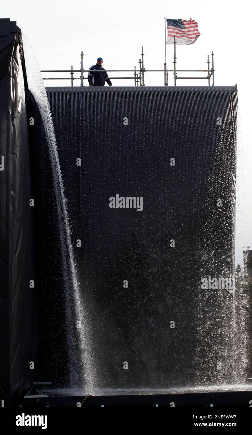 Ribbons of water flow off a mock-up waterfall designed for the National ...