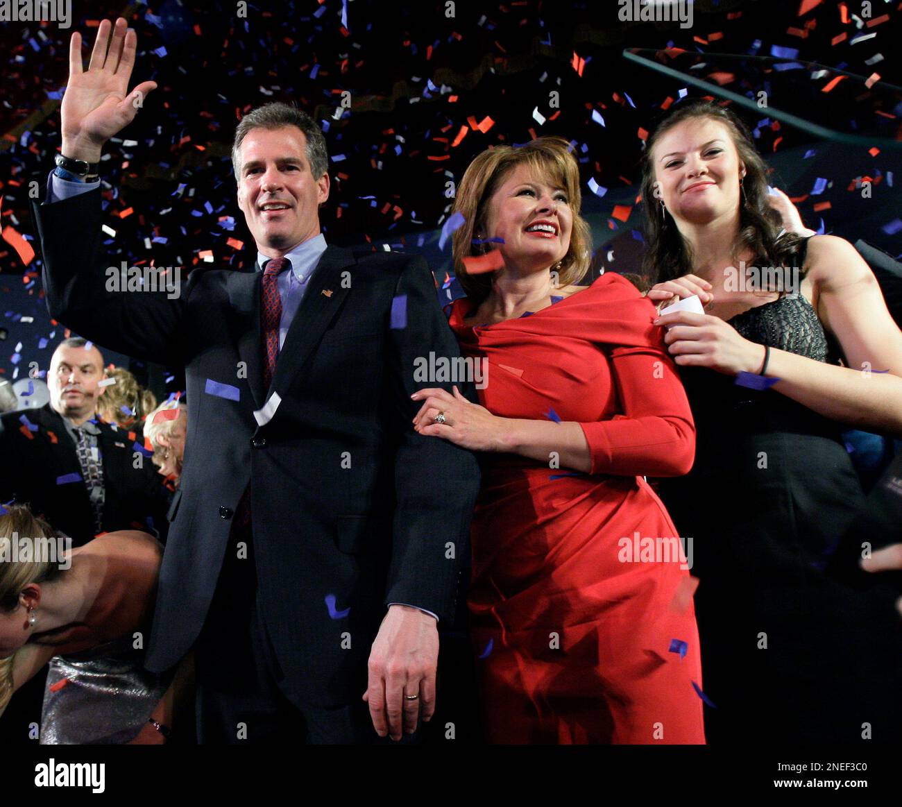 U.S. Senator-elect Scott Brown waves with his wife, Gail Huff, center ...