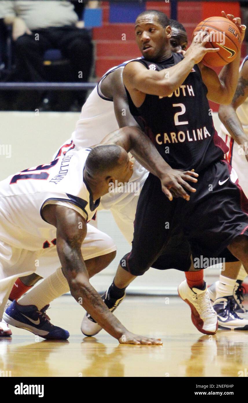 South Carolina guard Devan Downey (2) pulls away a rebound from ...