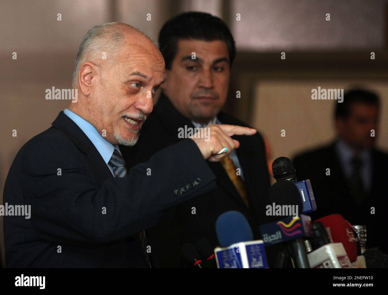 Iraqi Oil Minister Hussein al-Shahristani, left, speaks during a ...