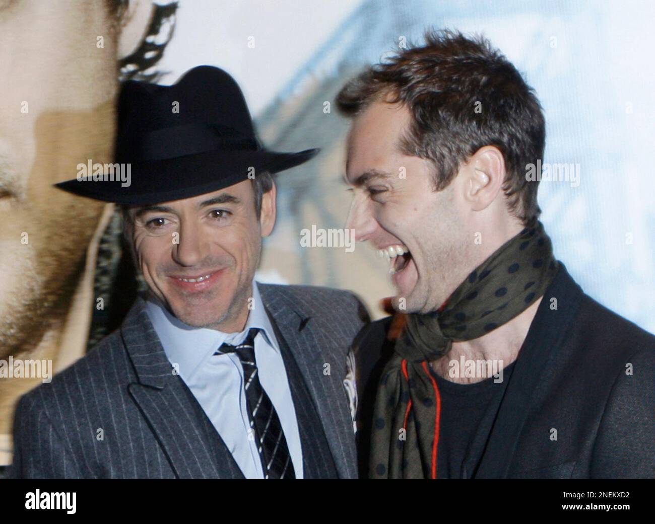 U.S. actor Robert Downey Jnr, left, and British actor Jude Law arrive ...