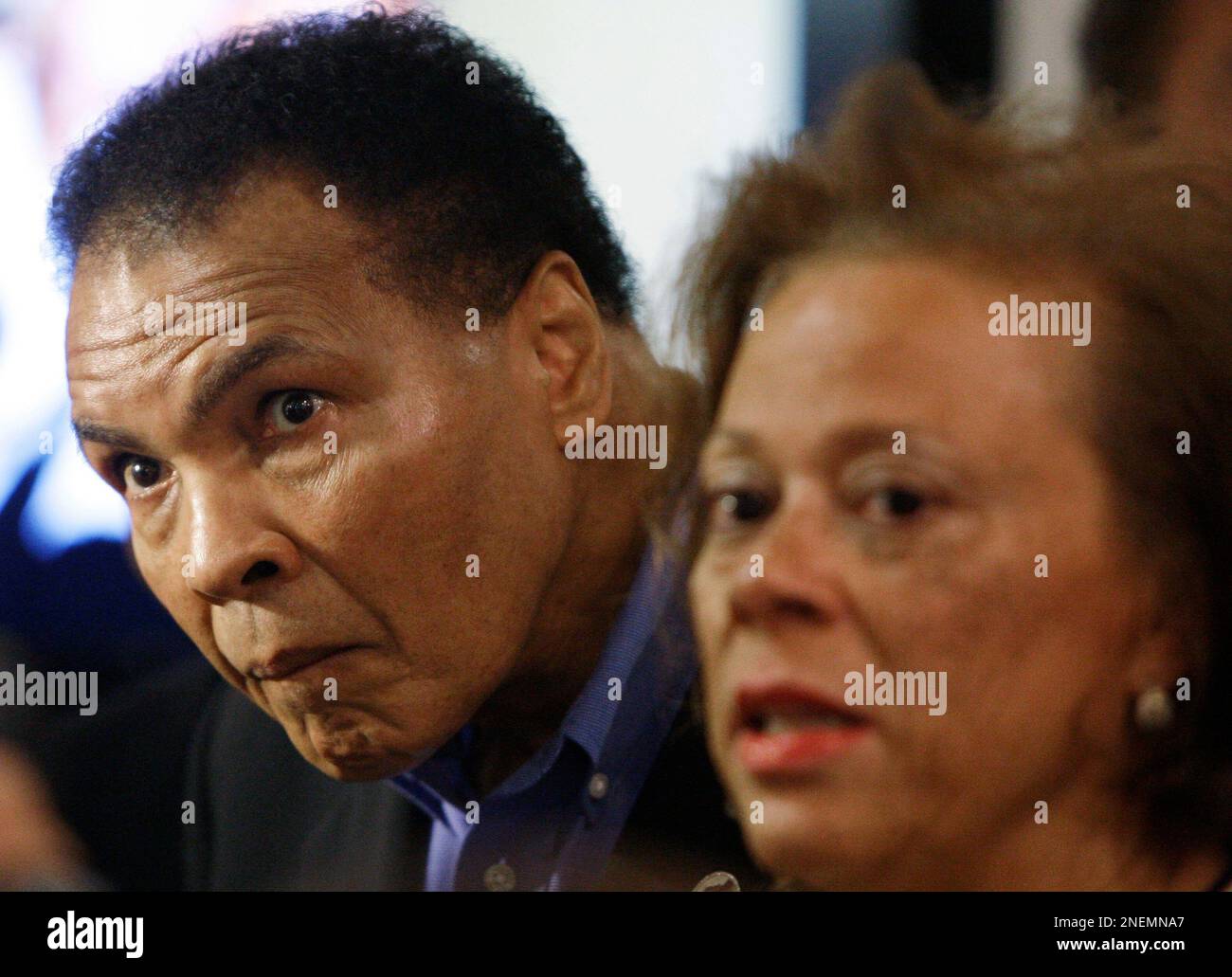 Former heavyweight boxing champion Muhammad Ali, left, with his wife ...