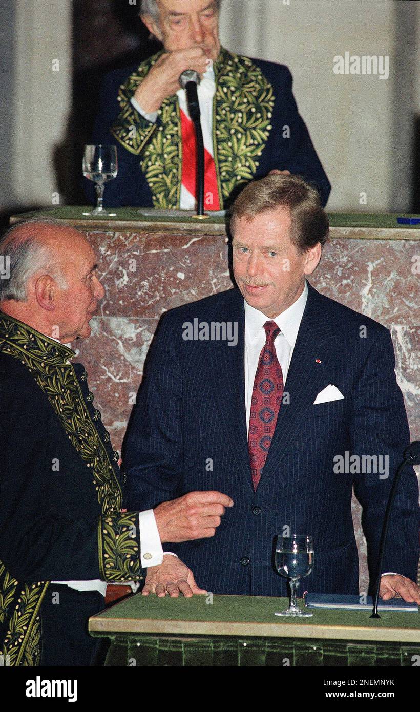 Former President of Czechoslovakia Vaclav Havel, right, listens to ...