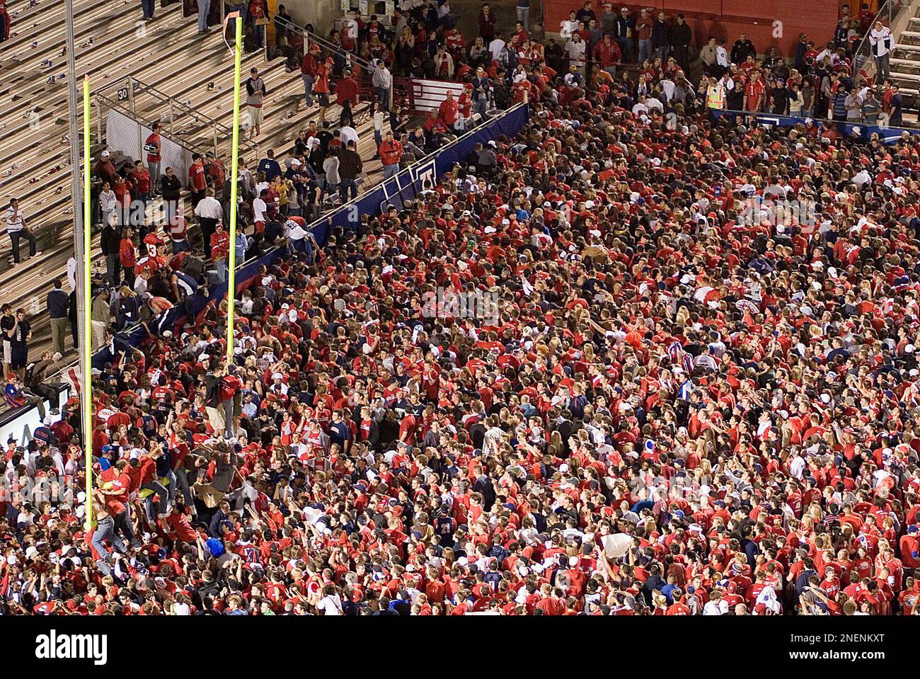 FILE - In this Nov. 15, 2007, file photo, Arizona fans storm the field ...