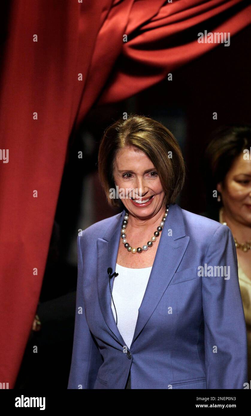 House Speaker Nancy Pelosi walks toward the stage before addressing an ...