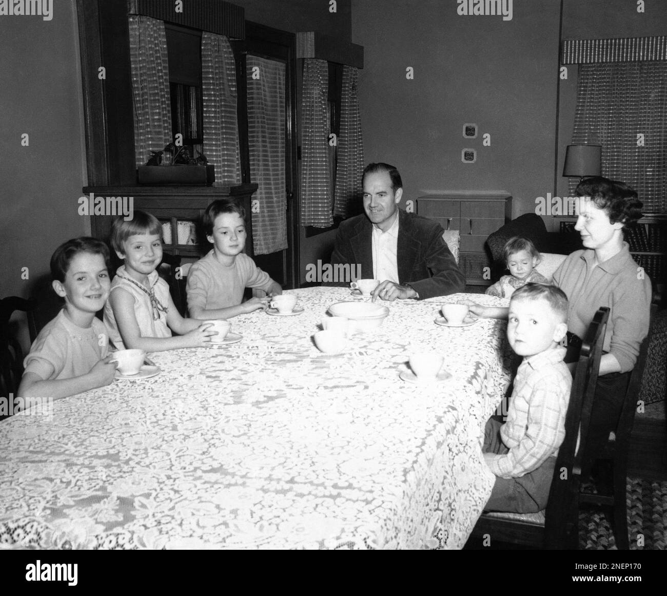 Sen. George McGovern sits down at the table with his family, July 12 ...