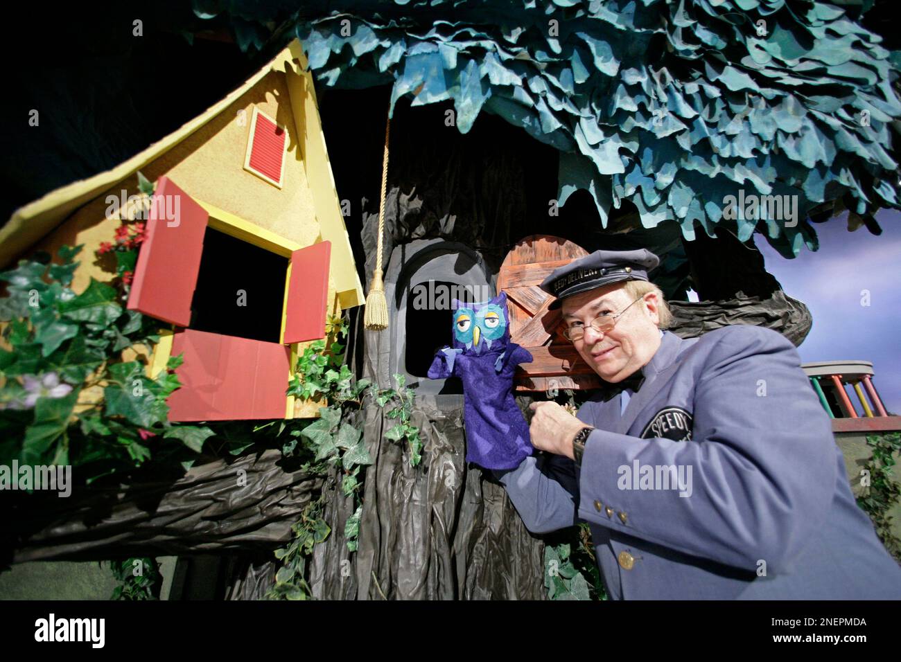 David Newell as Mr McFeely holds a replica X the Owl in the ...
