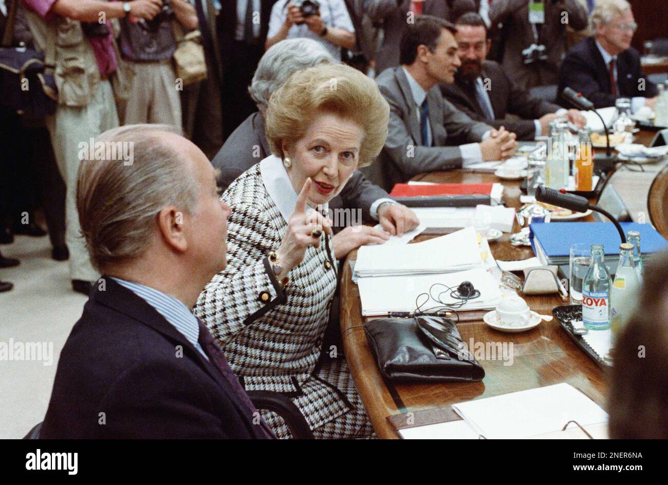 British Prime Minister Margaret Thatcher points to onlookers as she ...