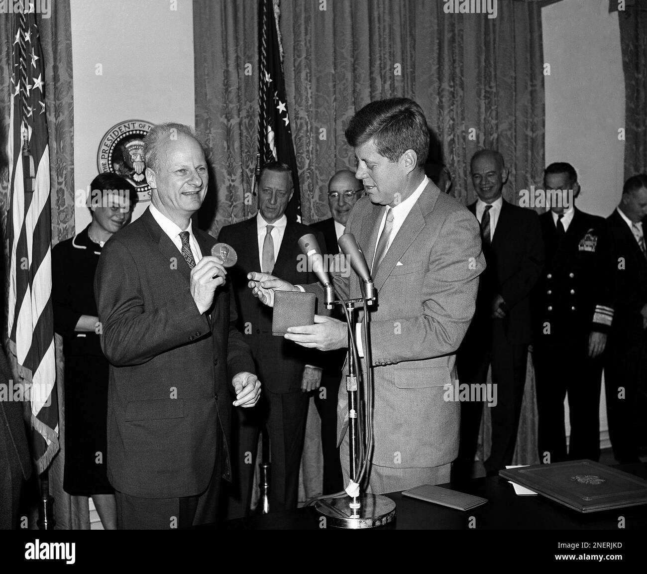 President John Kennedy presents the Enrico Fermi gold medal to Dr. Hans ...