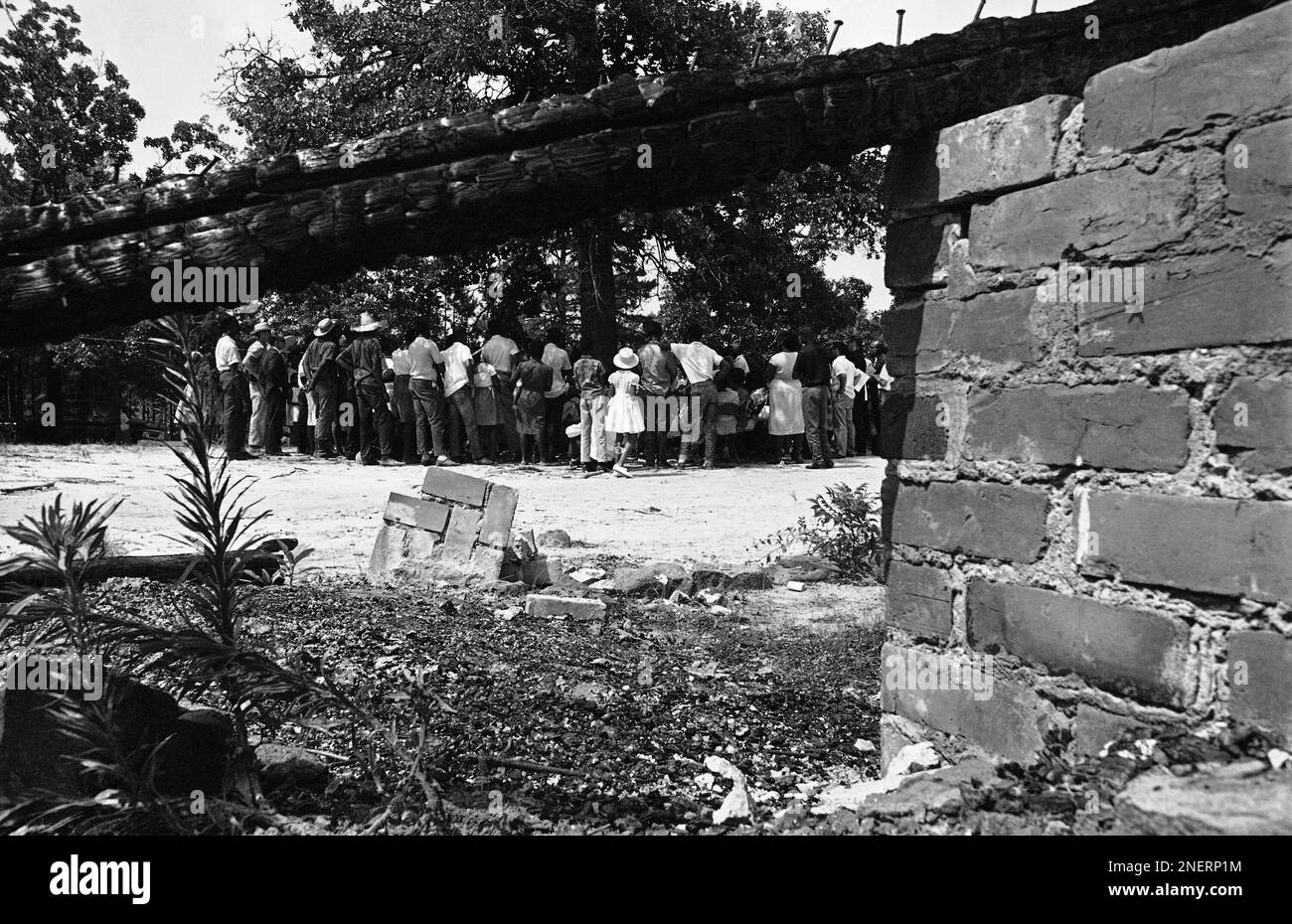 Memorial services for thee slain civil rights workers are framed ...