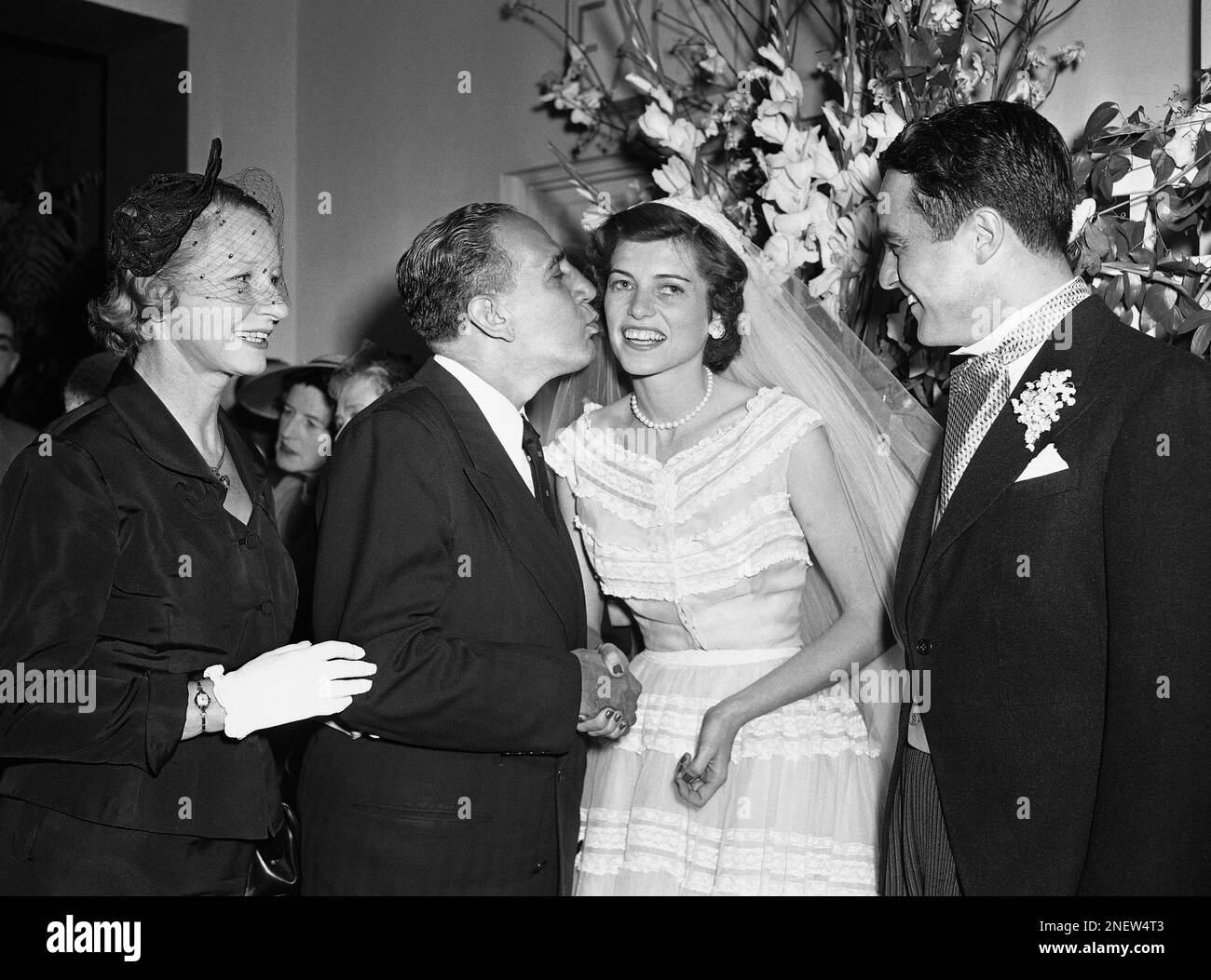 New York’s Mayor Vincent R. Impellitteri puckers up to plant kiss on ...