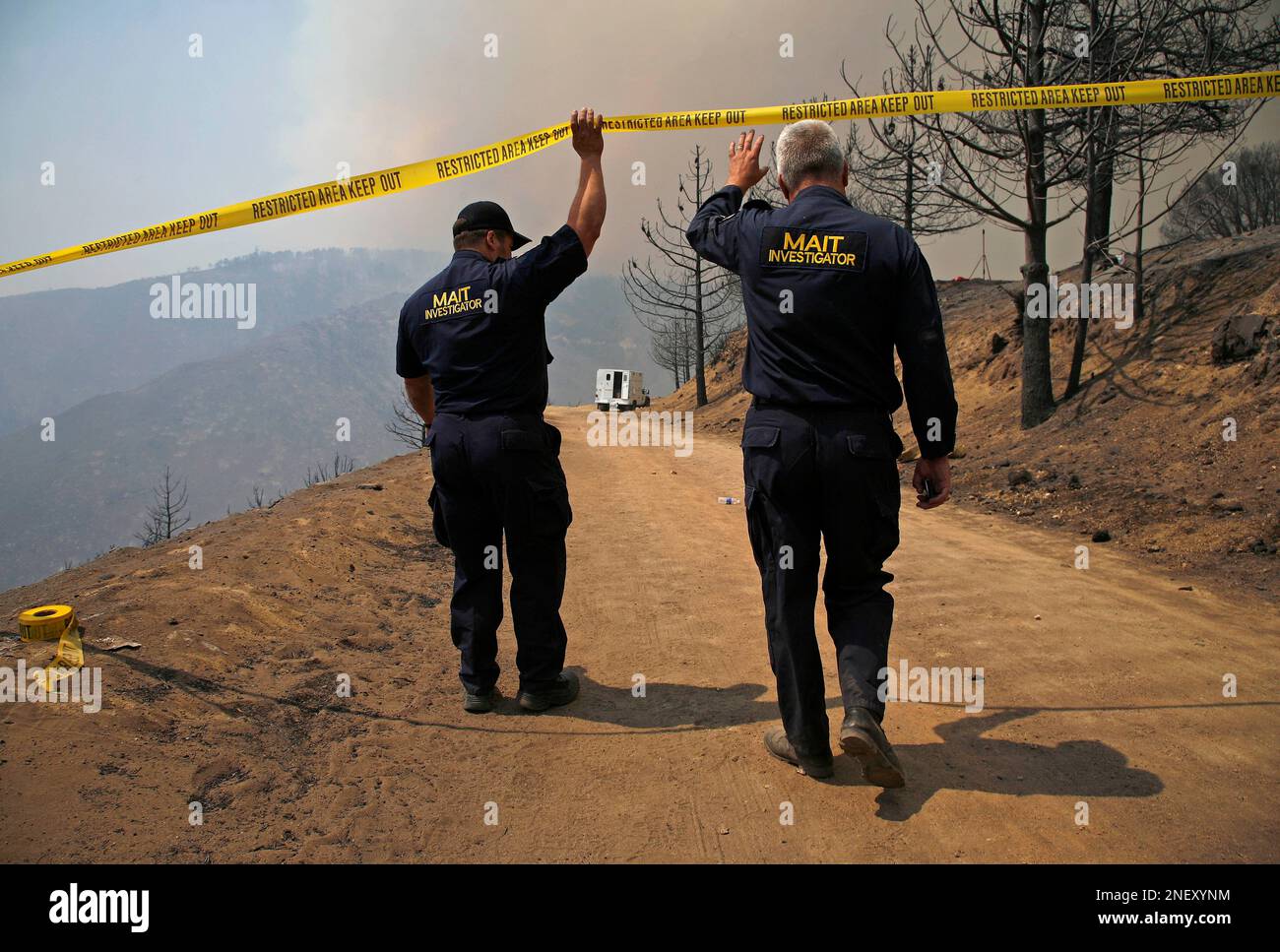 California Highway Patrol Officer John Isbister, left, and Sgt. Don ...