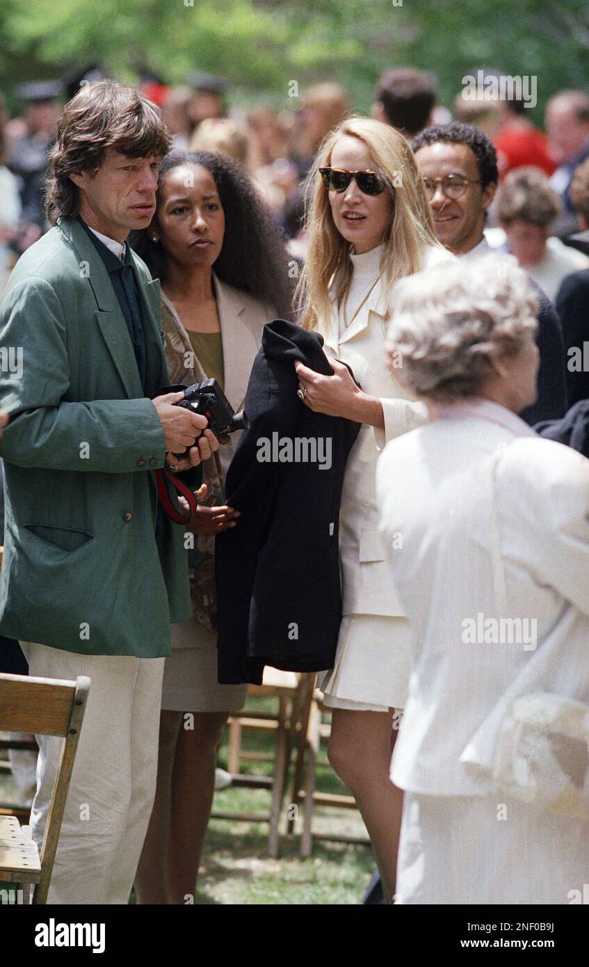 Rolling Stones member Mick Jagger, left, and his wife, model Jerry Hall ...