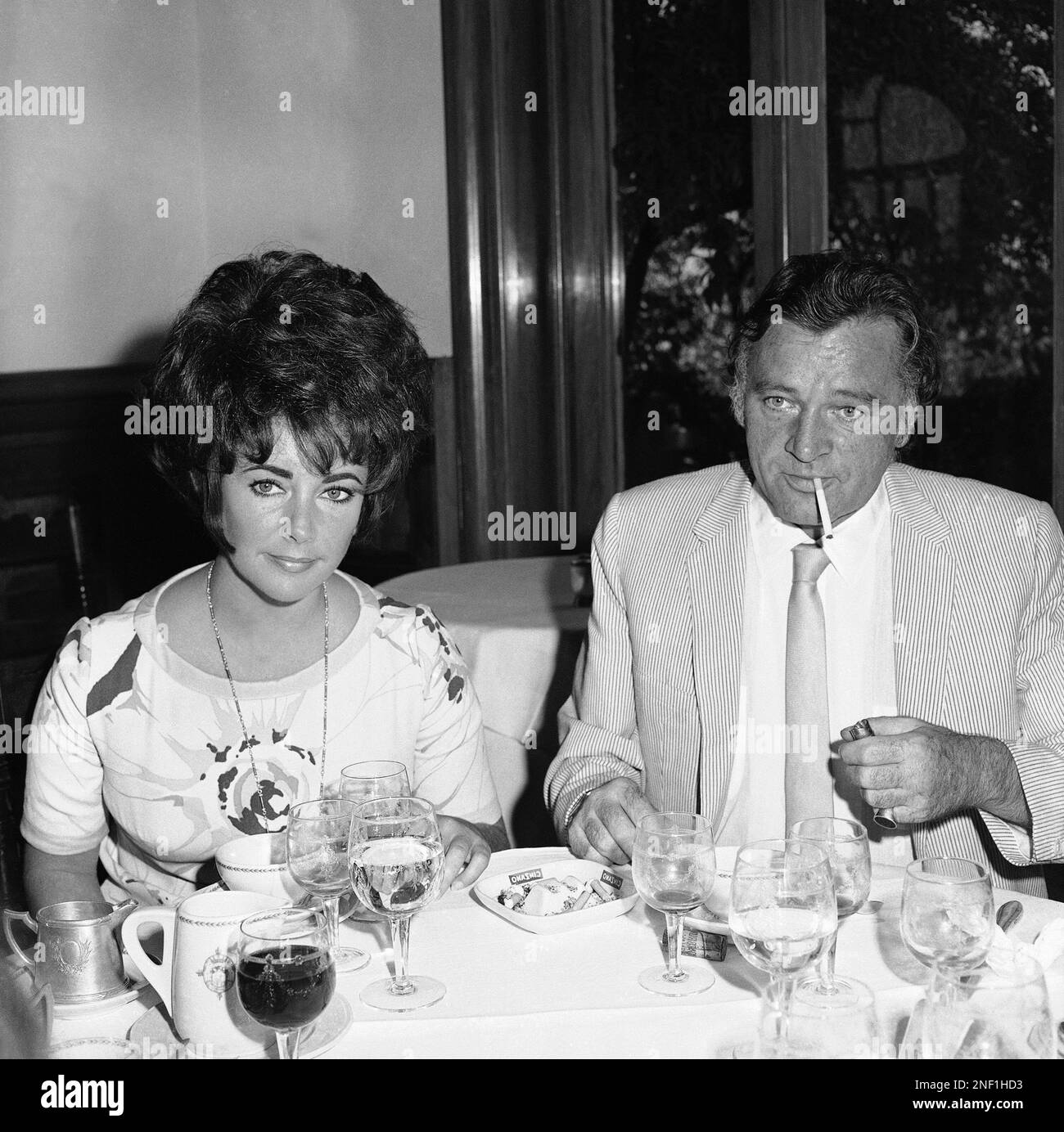 British actress Elizabeth Taylor and her husband, actor Richard Burton ...