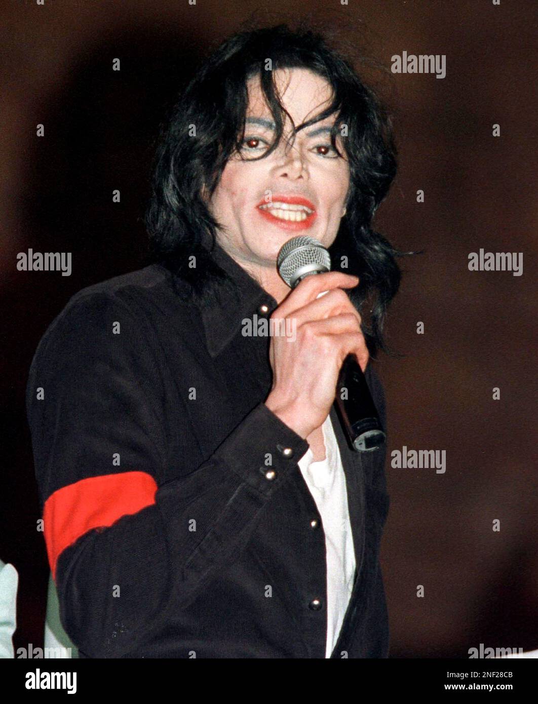 Singer Michael Jackson performs at the Royal Towers grand opening gala ...