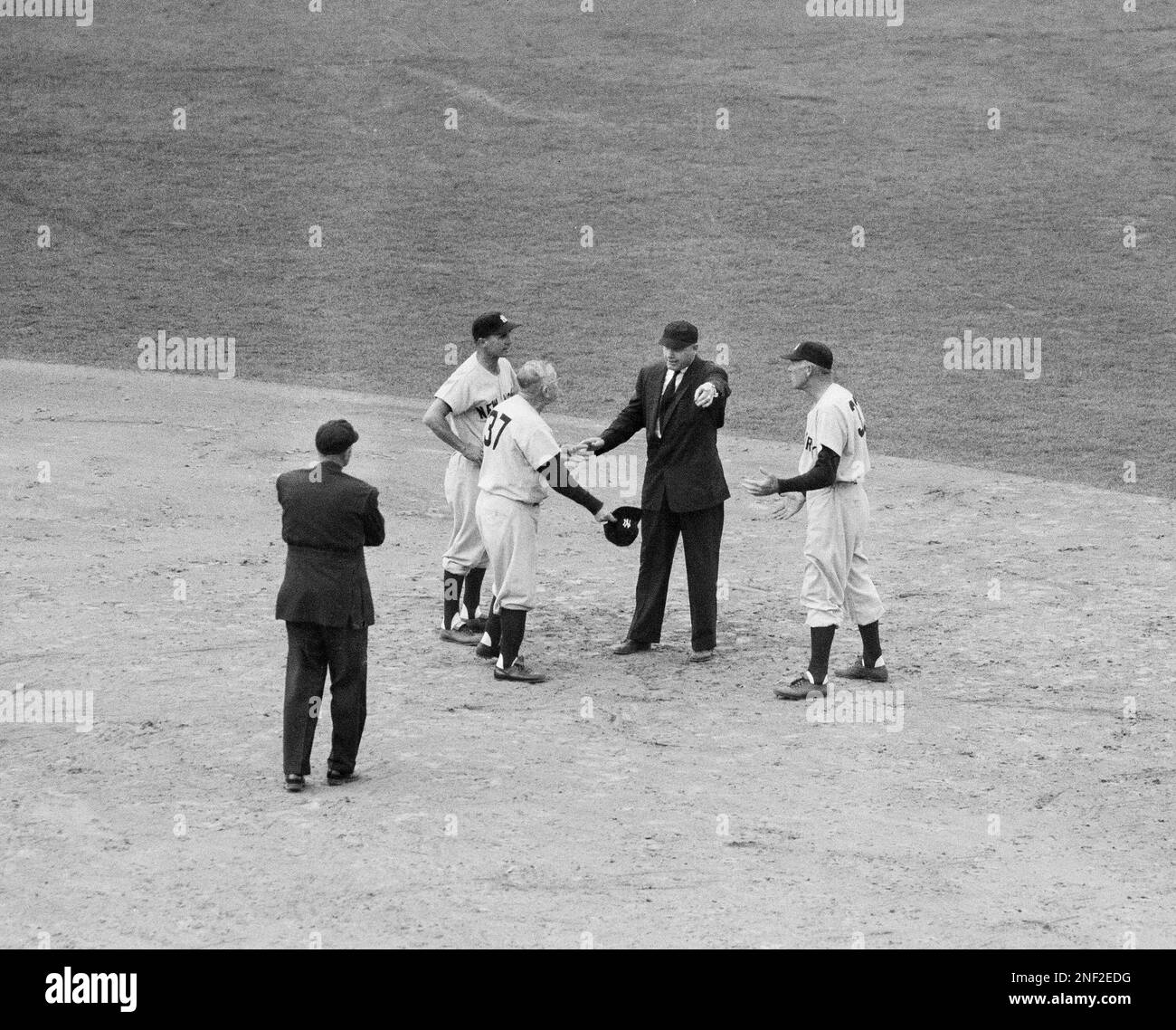 Manager Casey Stengel of the New York Yankees pleads with umpire Ed ...