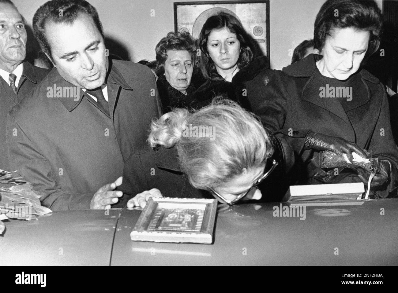 Tina Niarchos prays at the coffin of her dead son Alexandros Onassis in ...