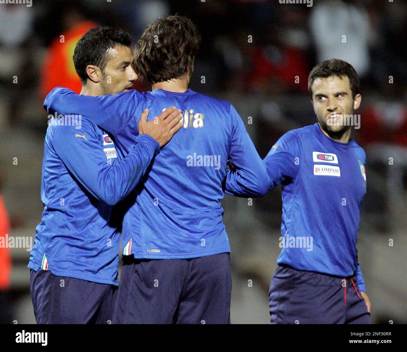 Italy's Fabio Quagliarella, left, reacts with his teammates Alberto ...