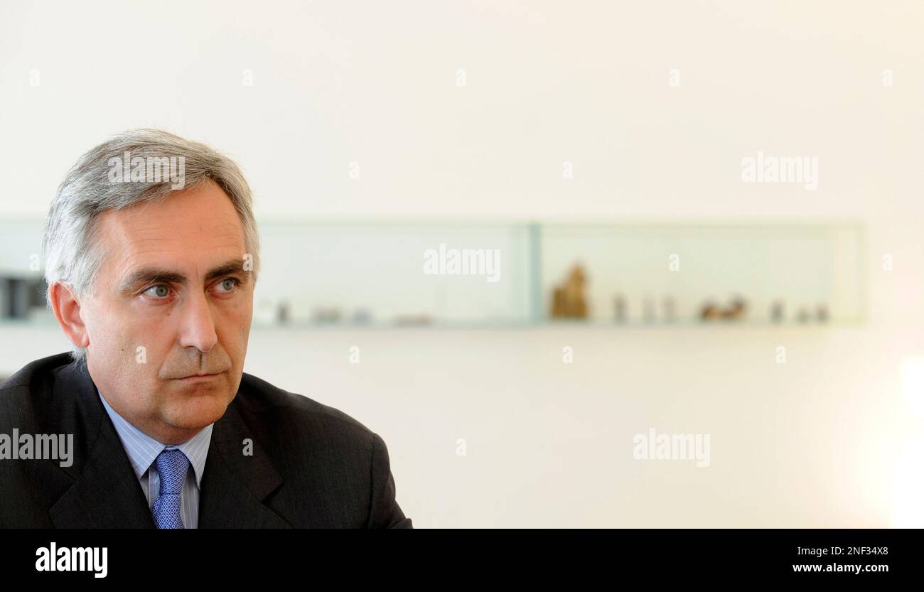 Peter Loescher, CEO of the German Siemens AG, sits during an interview ...
