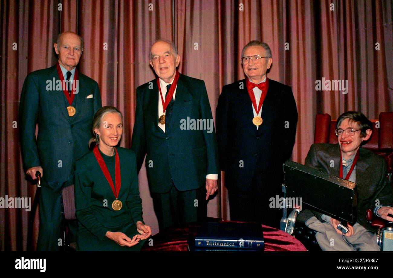 British astrophysicist, Dr. Stephen Hawking, far right, is shown with ...