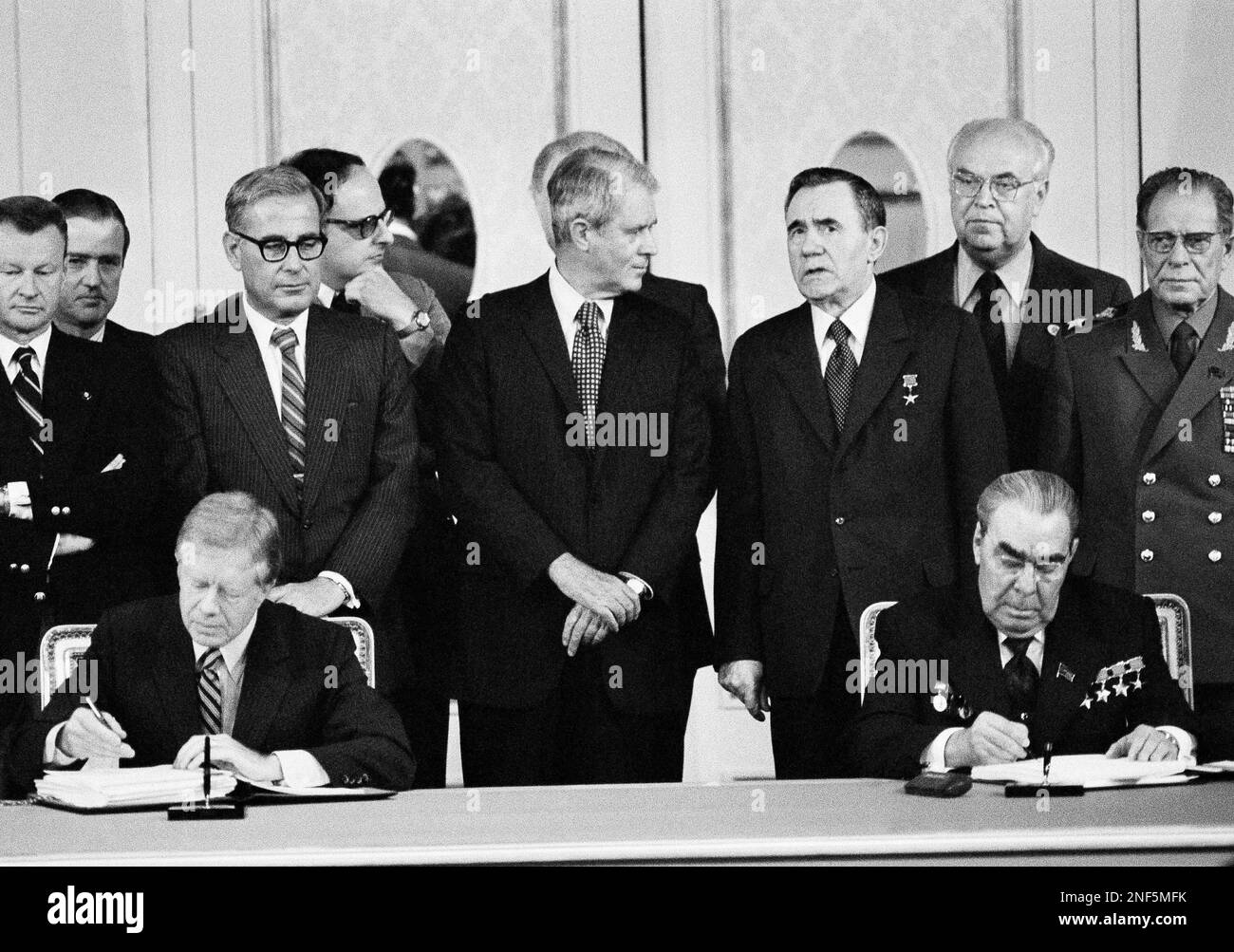 U.S. President Jimmy Carter, left seated, and Soviet President Leonid ...