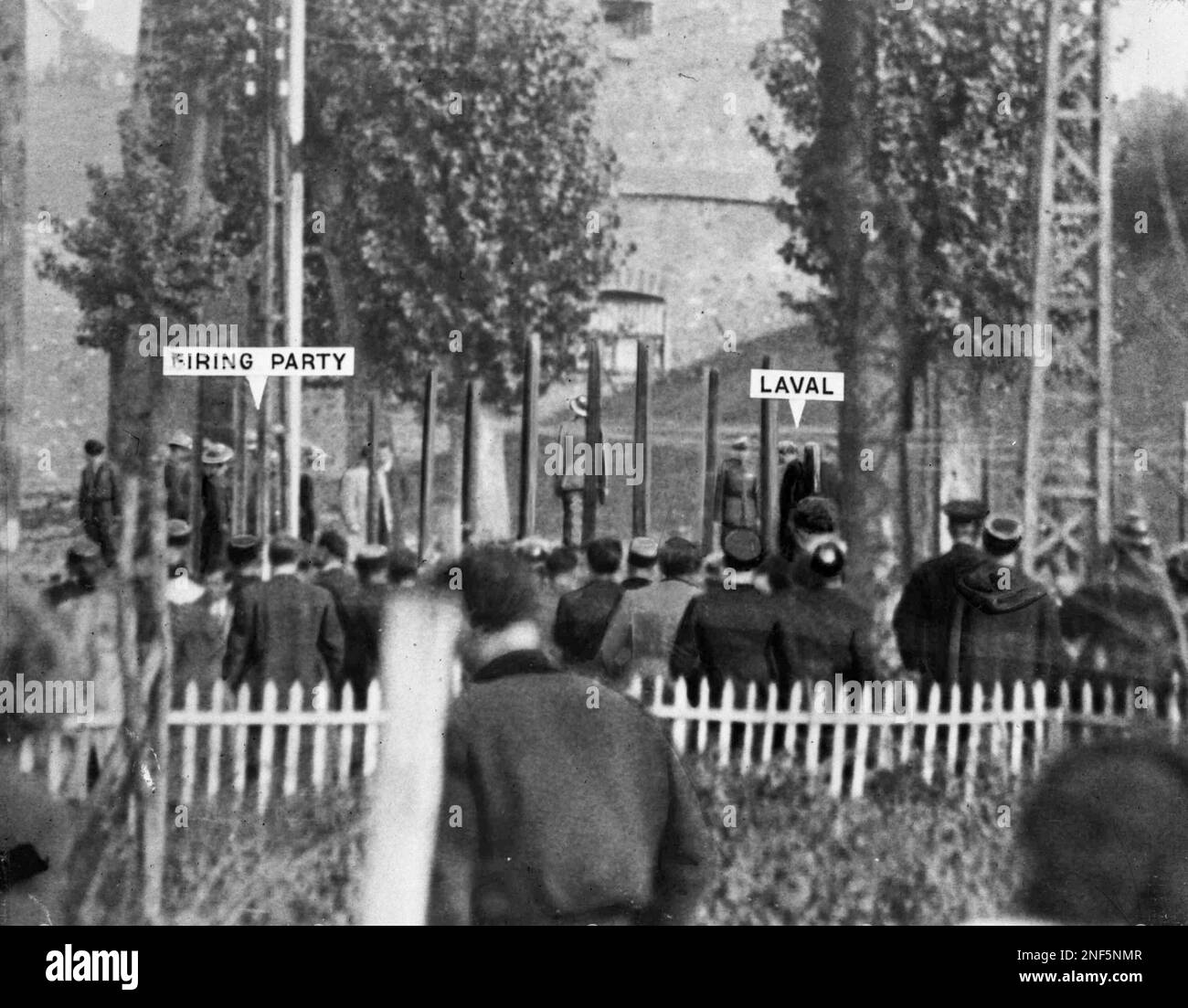 Ex-Premier of Vichy France Pierre Laval, right, blindfolded and hands ...