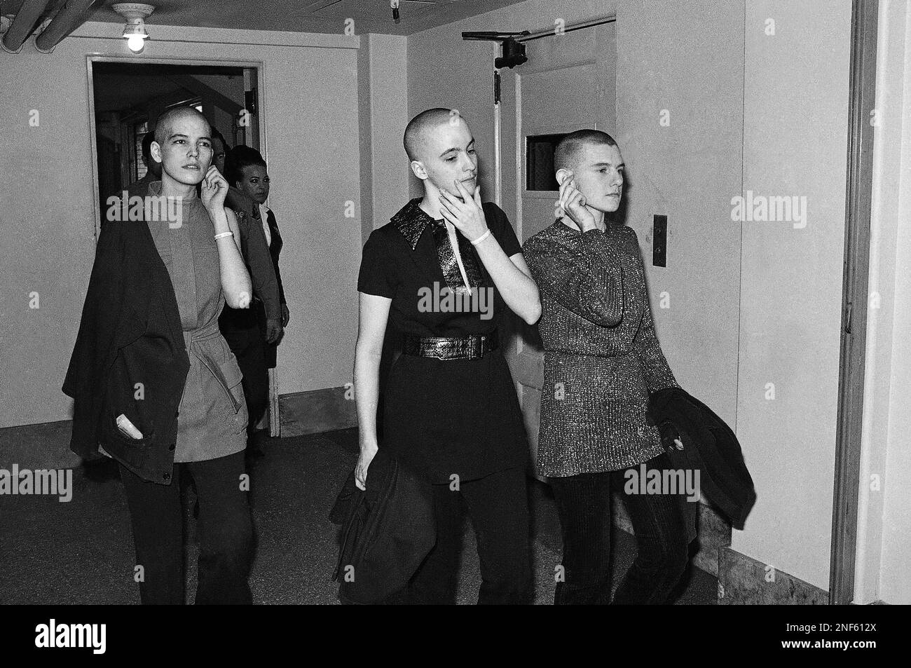 Three women defendants return to their cells after they were sentenced ...